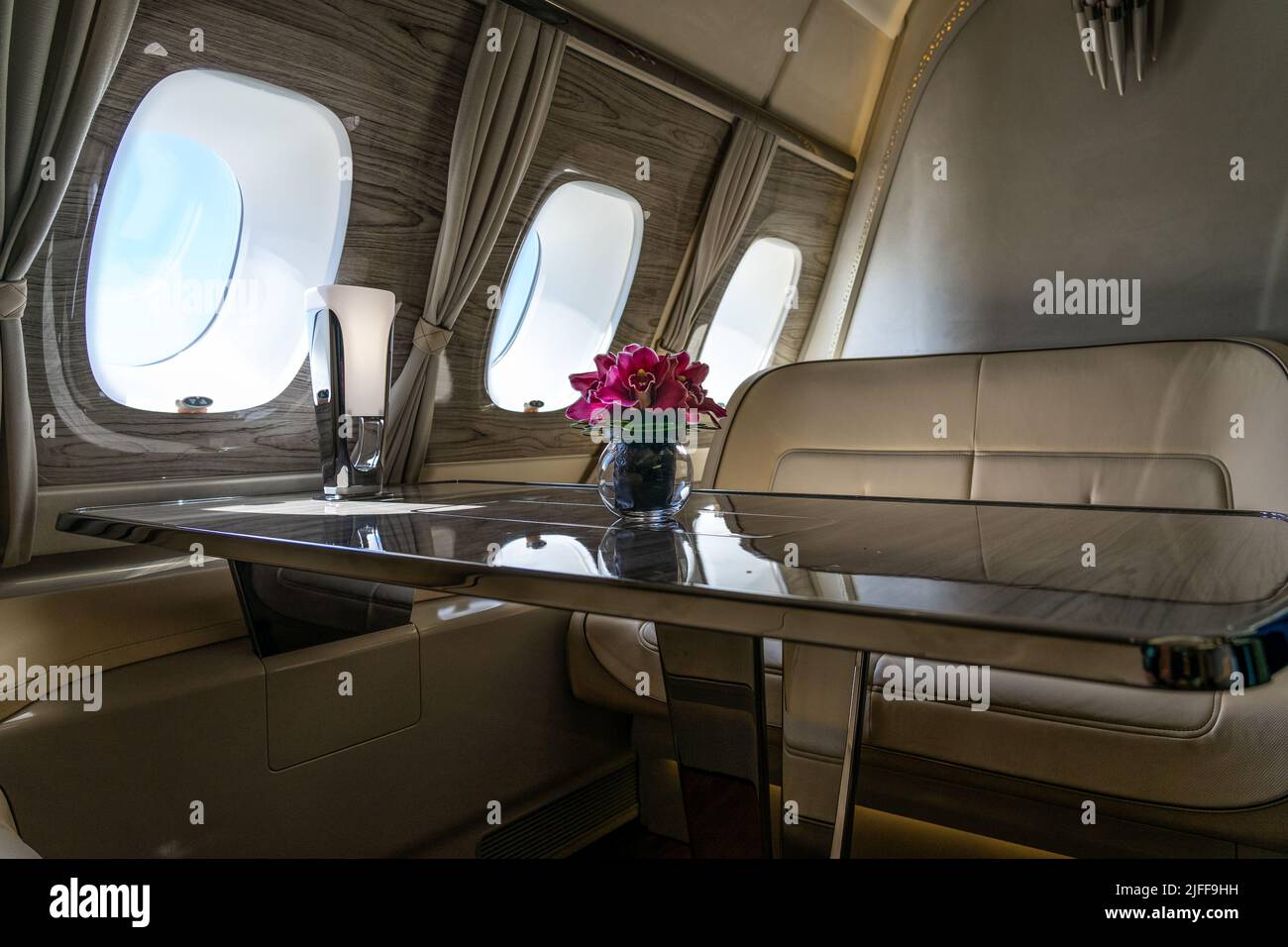 Interior of a business class of a commercial passenger plane, an ...