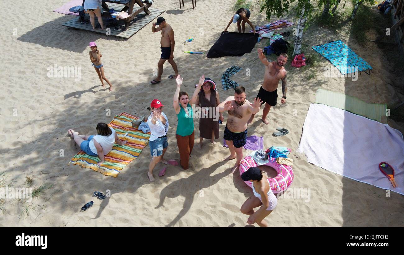 Drone photo of people resting on beach Stock Photo - Alamy