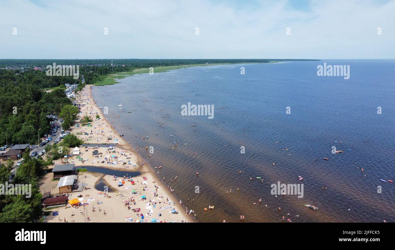 Drone photo of people resting on beach Stock Photo - Alamy