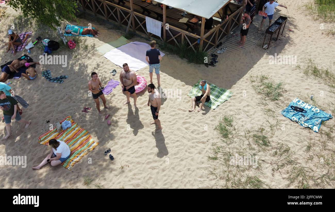 Drone photo of people resting on beach Stock Photo - Alamy