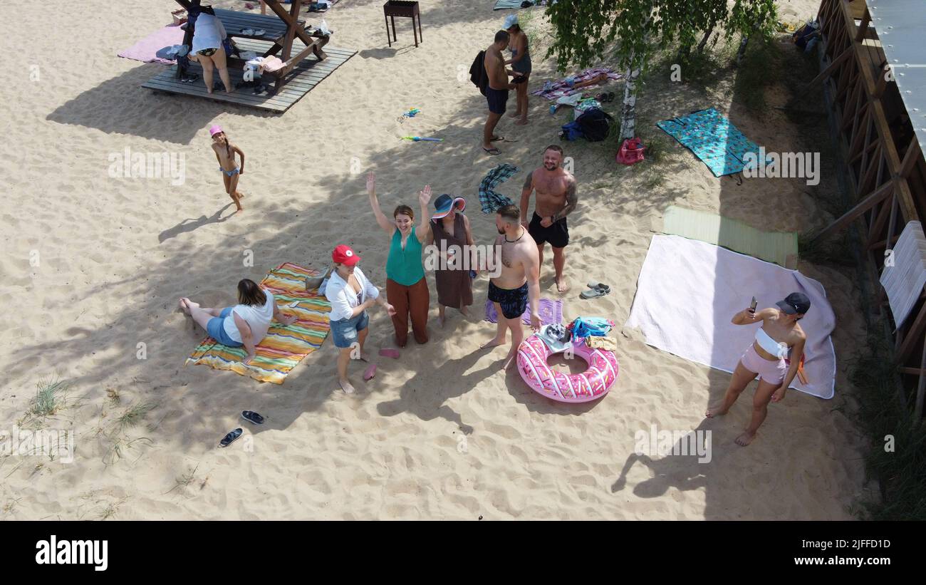 Drone photo of people resting on beach Stock Photo - Alamy