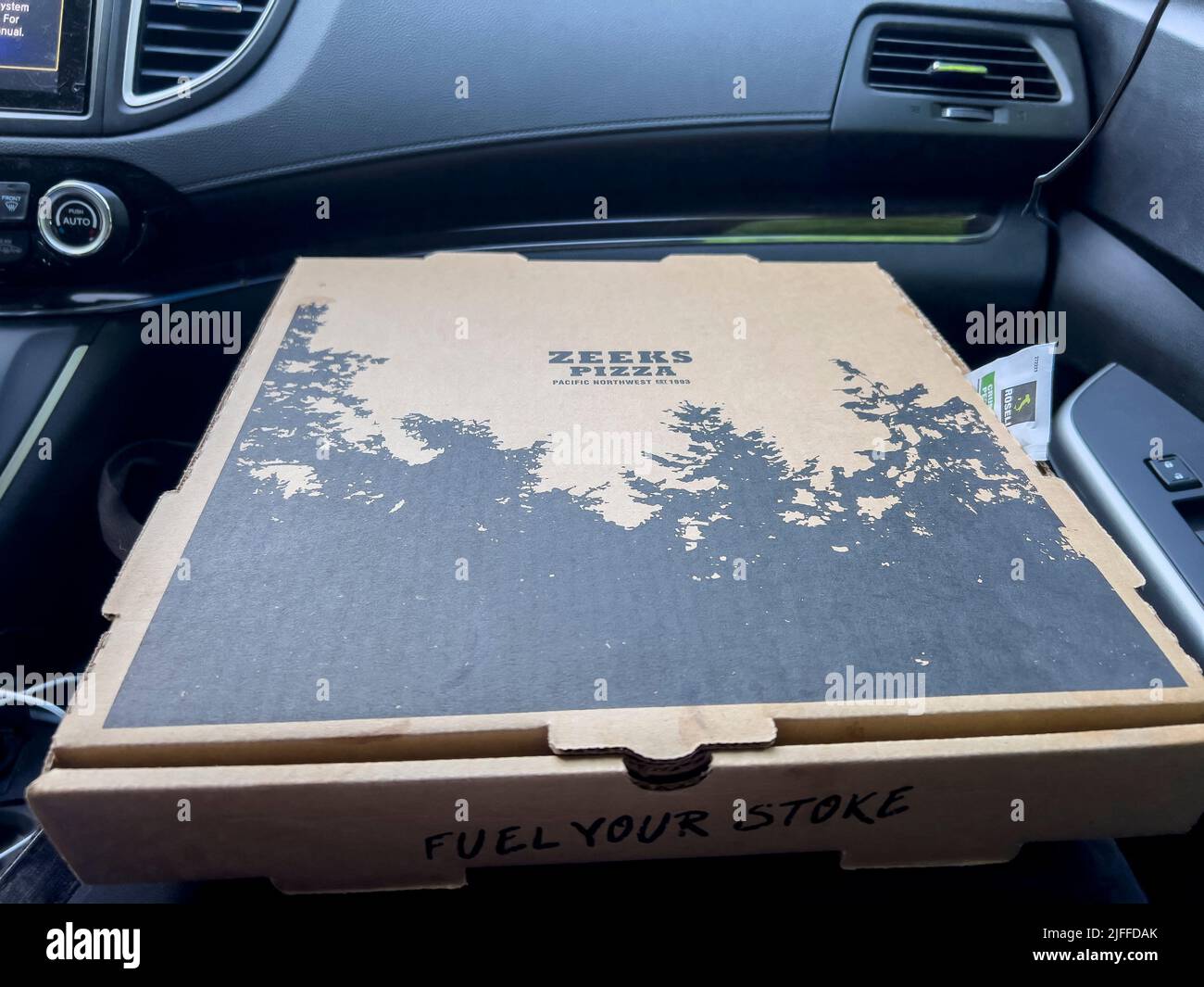 Seattle, WA USA - circa May 2022: Close up view of a Zeek's pizza box ...
