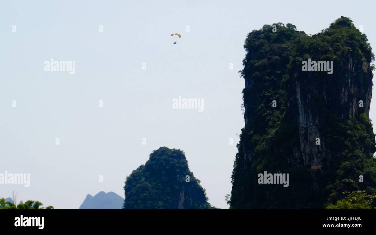 The big rocks of the Karst mountains in China Stock Photo - Alamy