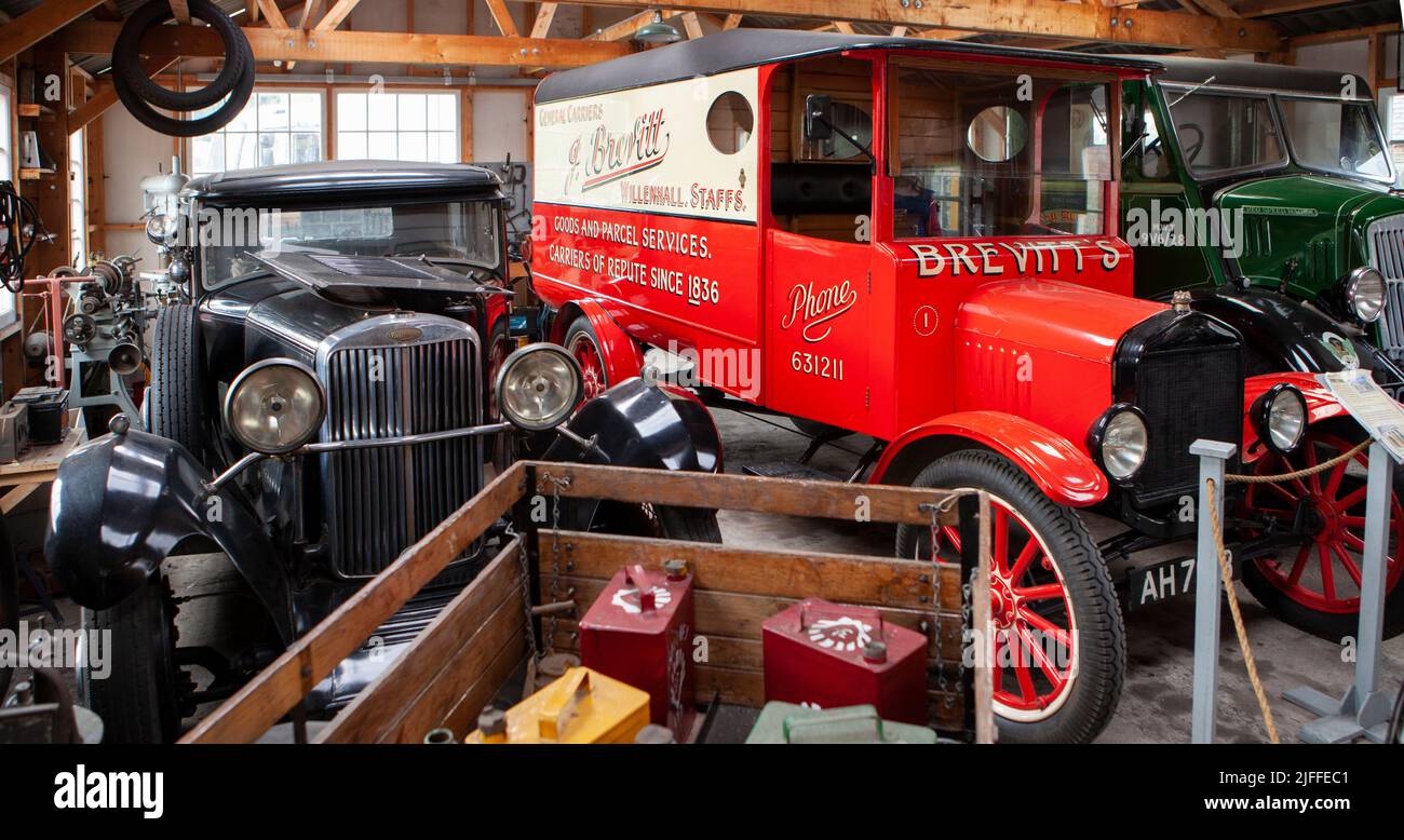 vintage vehicles in an old garage Stock Photo - Alamy