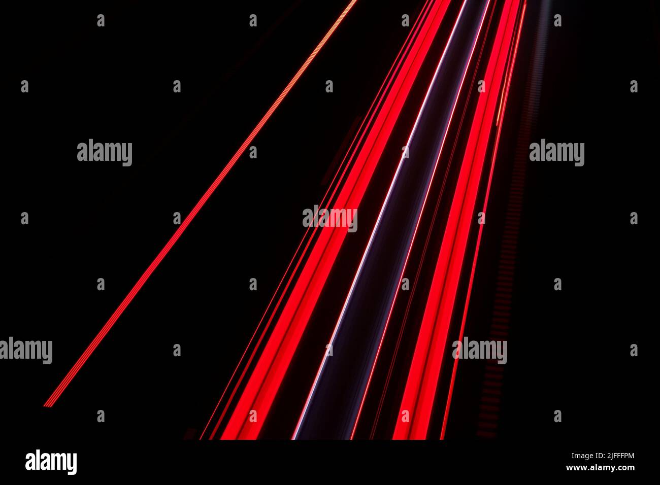 Night traffic. Streaks of tail lights at a long exposure Stock Photo ...