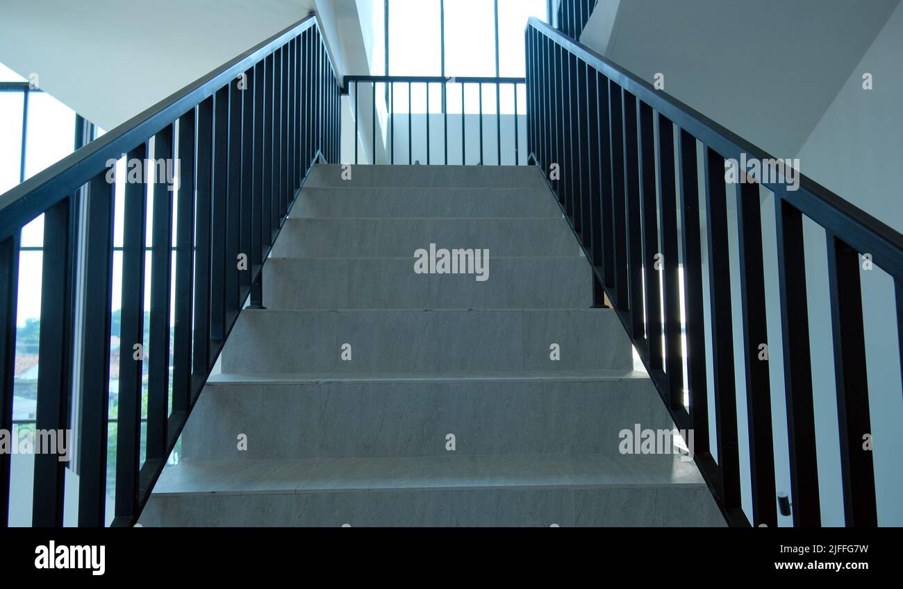 Indoor ceramic staircase. White ceramic staircase with minimalist ...