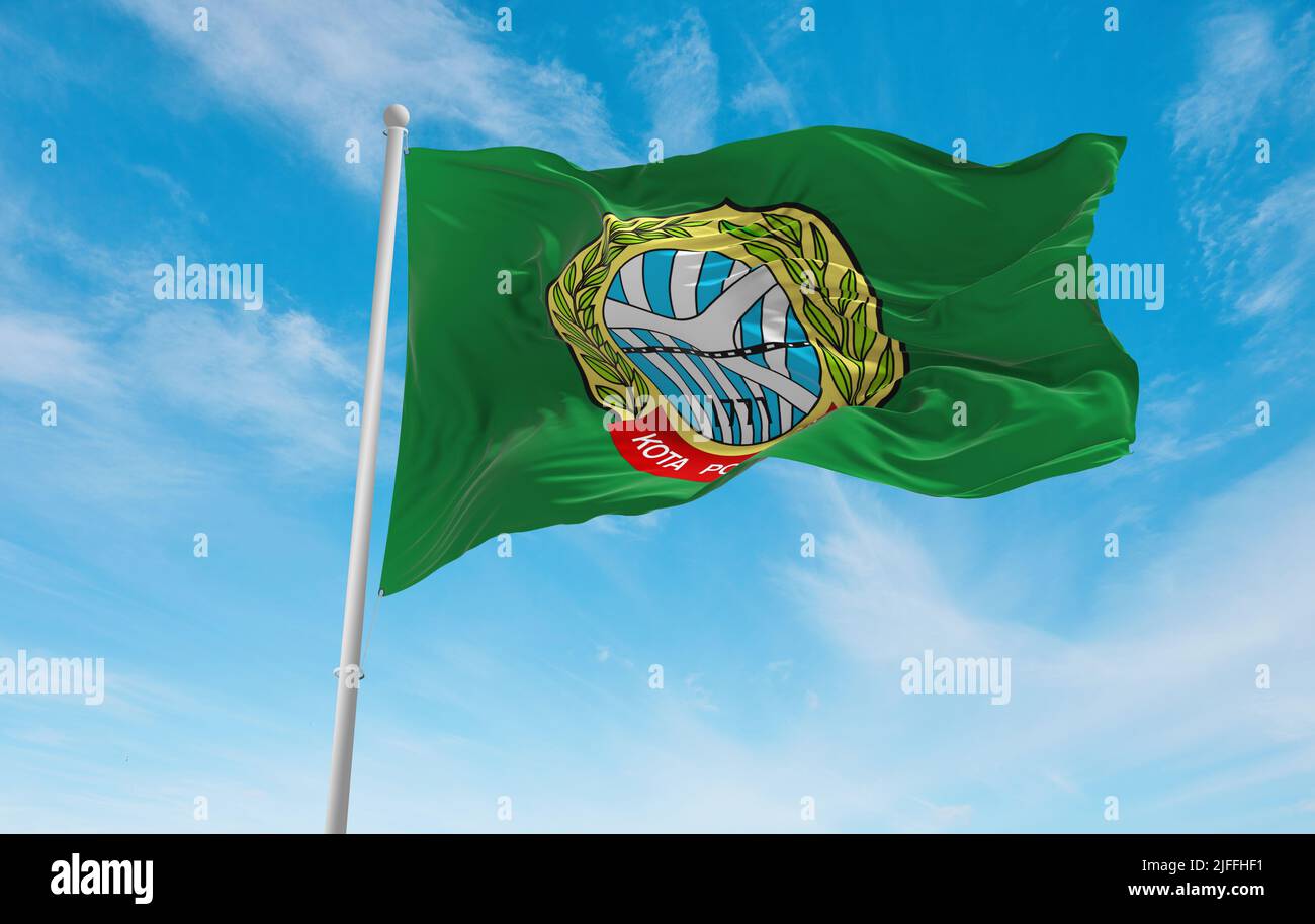 official flag of Pontianak City Indonesia at cloudy sky background on ...