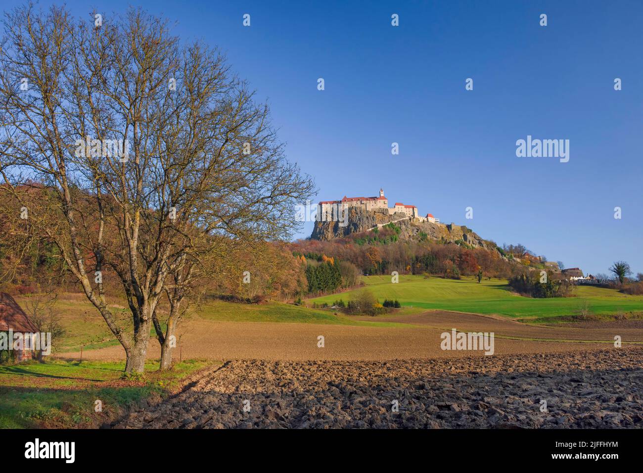 The medieval Riegersburg Castle on top of a dormant volcano, surrounded ...