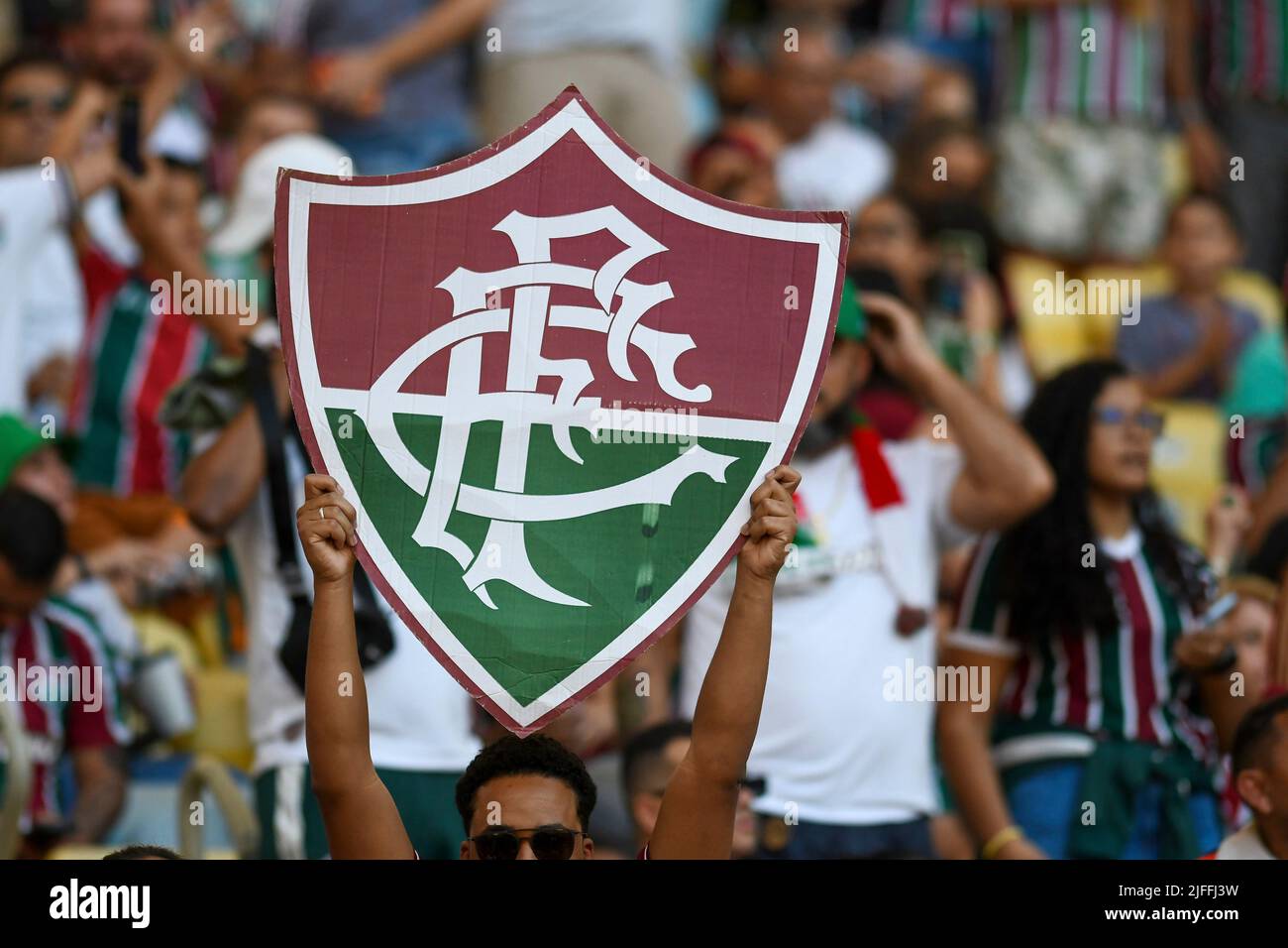 Rio, Brazil - July 02, 2022: fan holding the tricolor shield in match ...