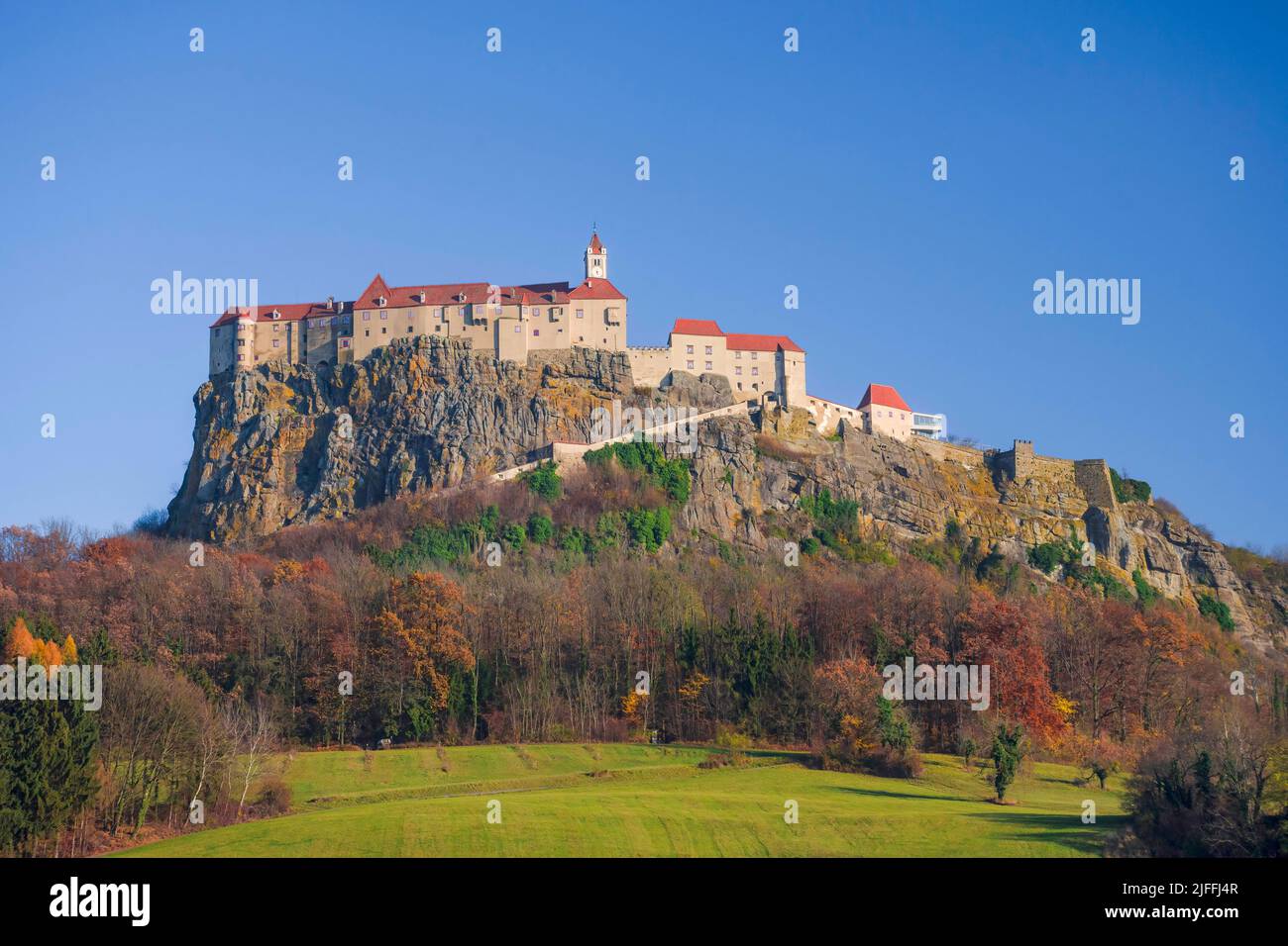 The medieval Riegersburg Castle on top of a dormant volcano, surrounded ...