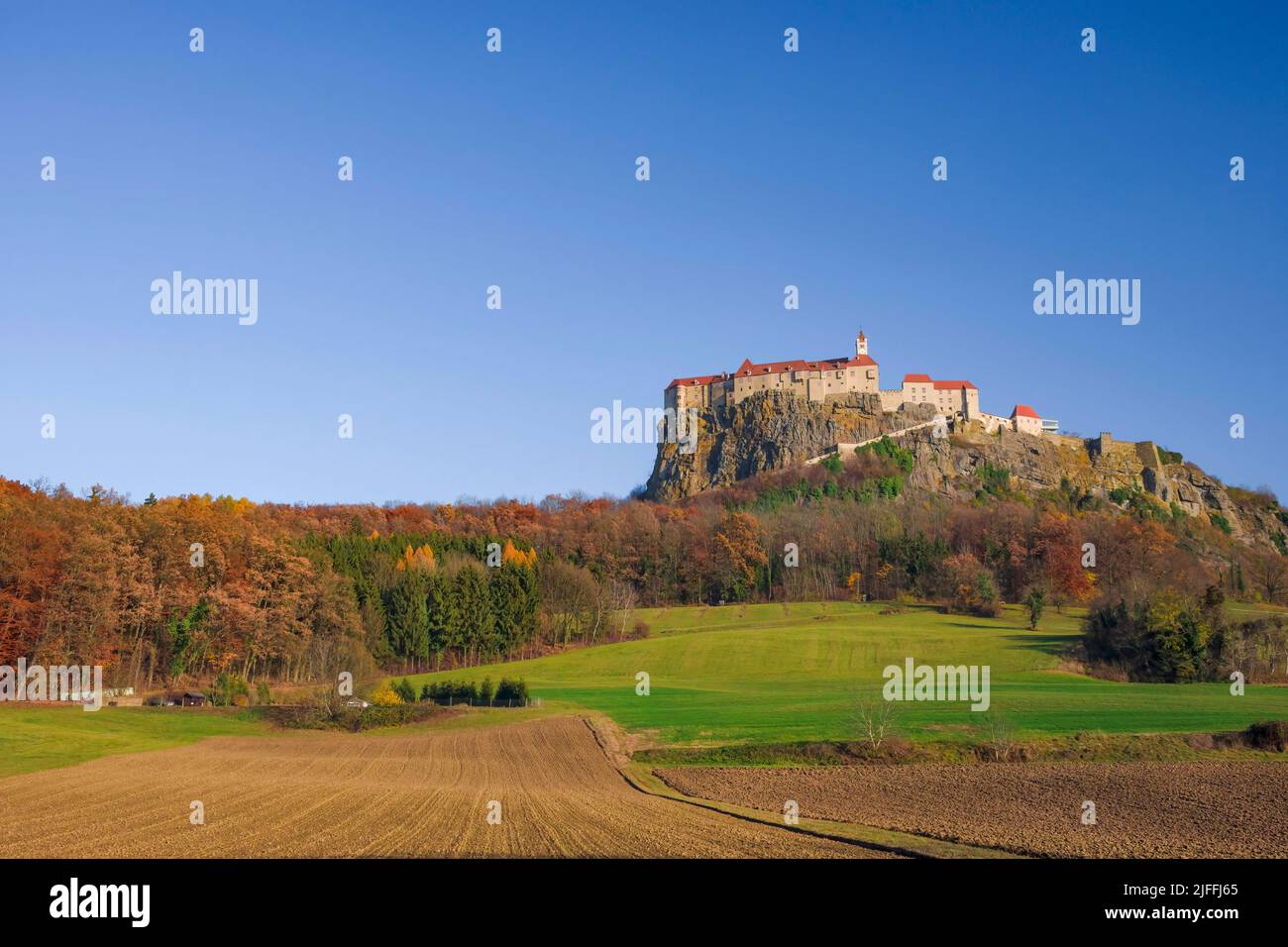 The medieval Riegersburg Castle on top of a dormant volcano, surrounded ...