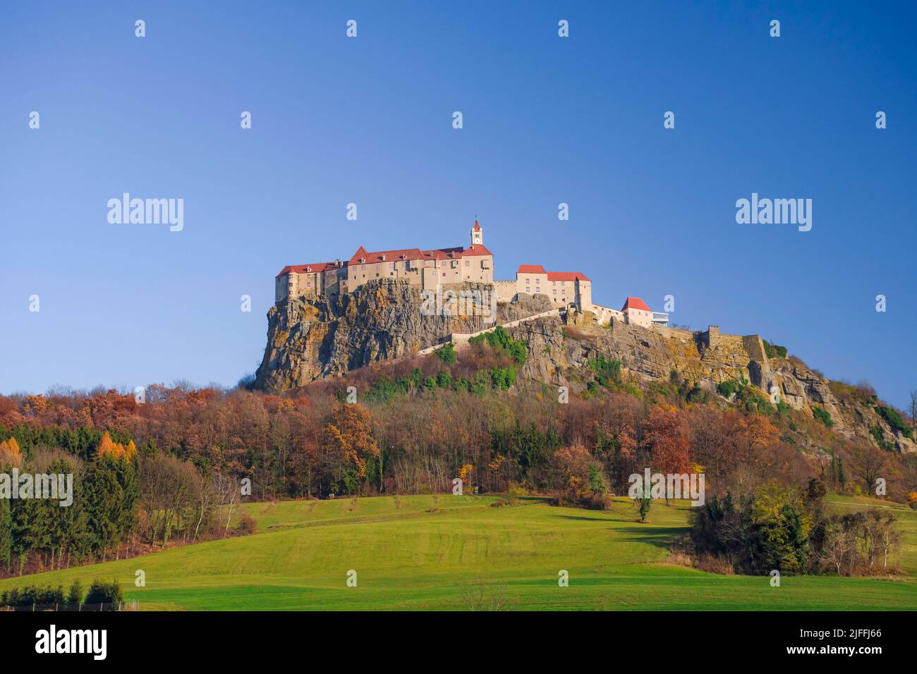 The medieval Riegersburg Castle on top of a dormant volcano, surrounded ...