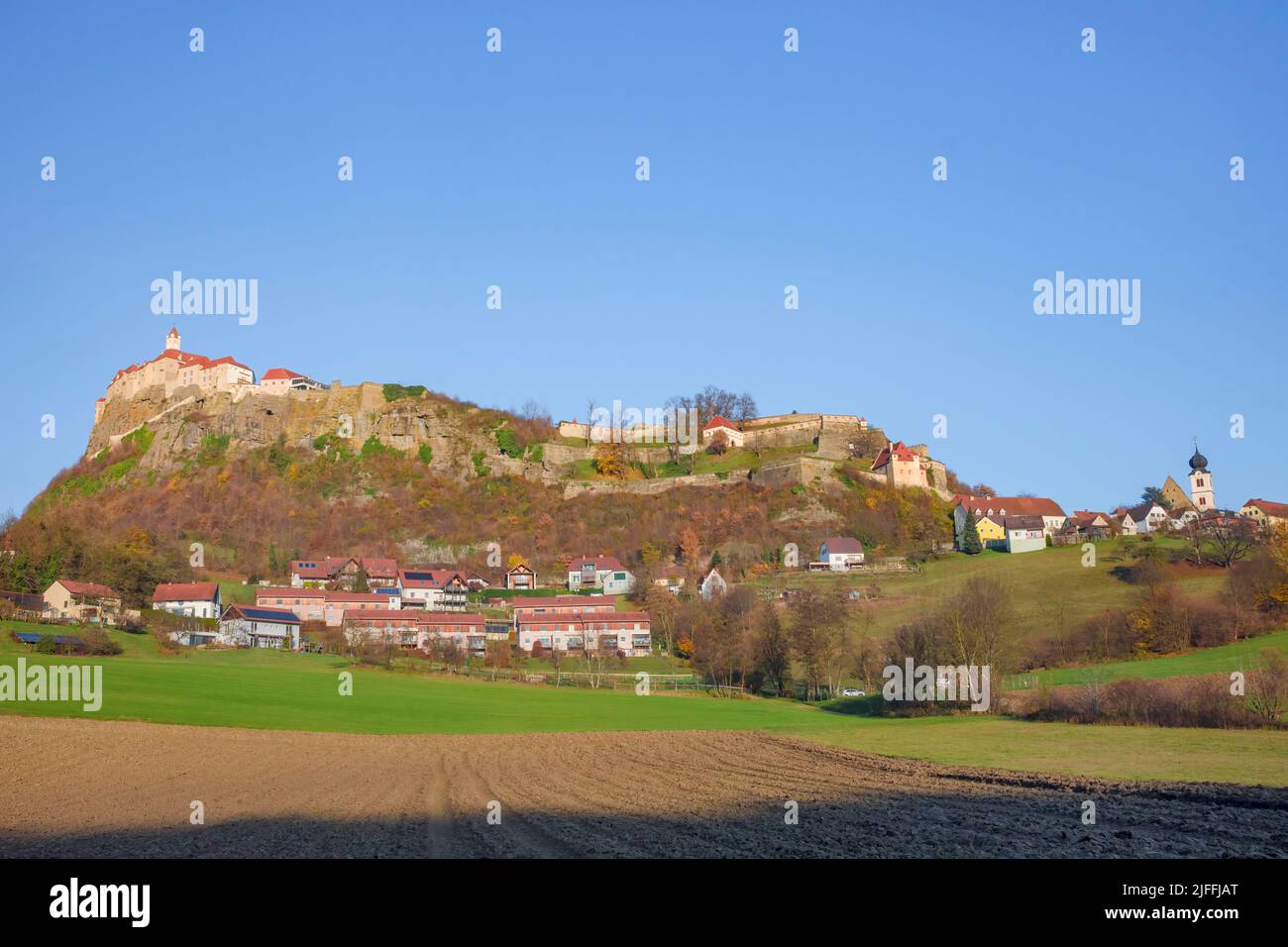 The medieval Riegersburg Castle on top of a dormant volcano, surrounded ...