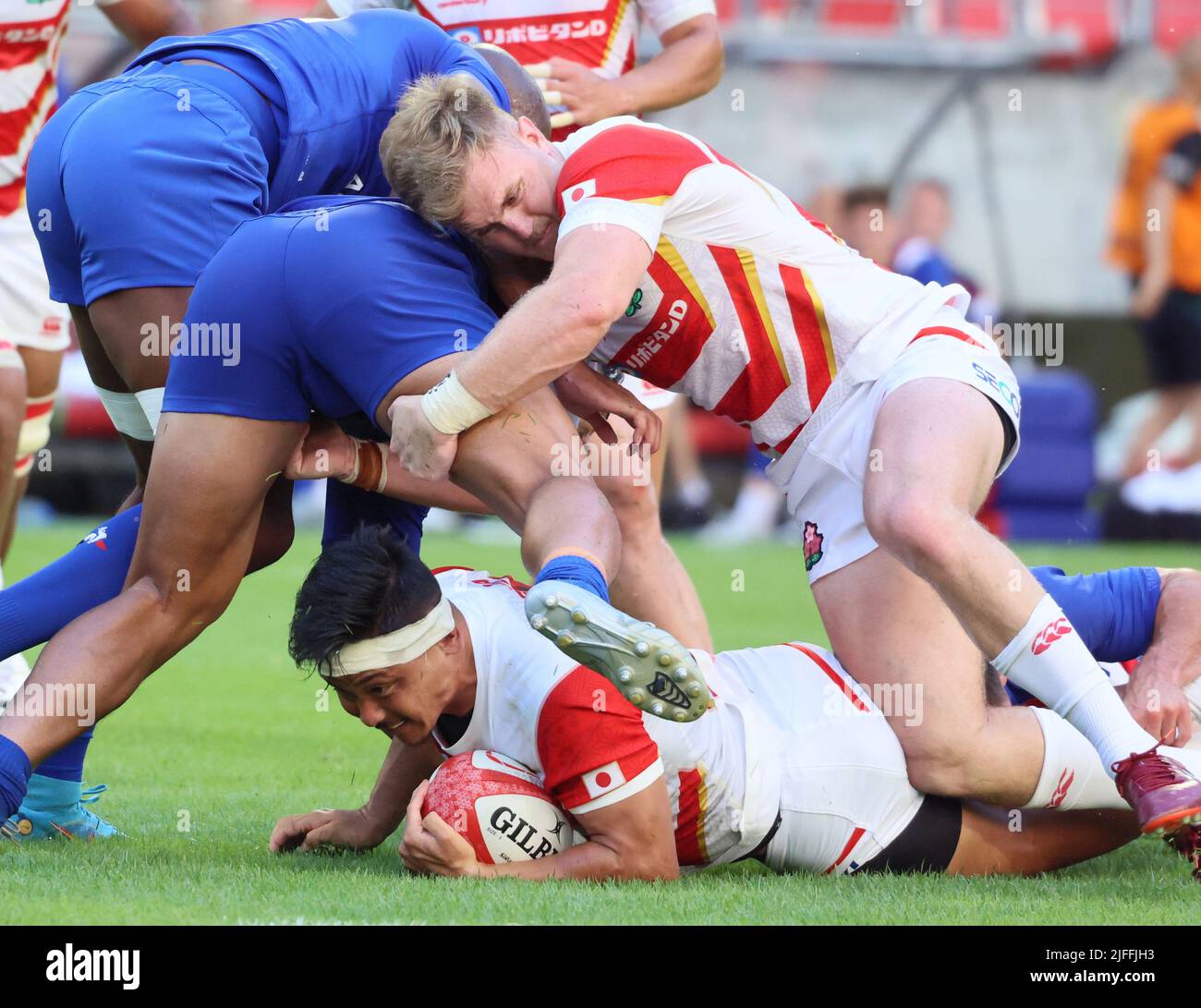 Toyota, Japan. 2nd July, 2022. Japan's wing Taichi Takahashi (bottom ...