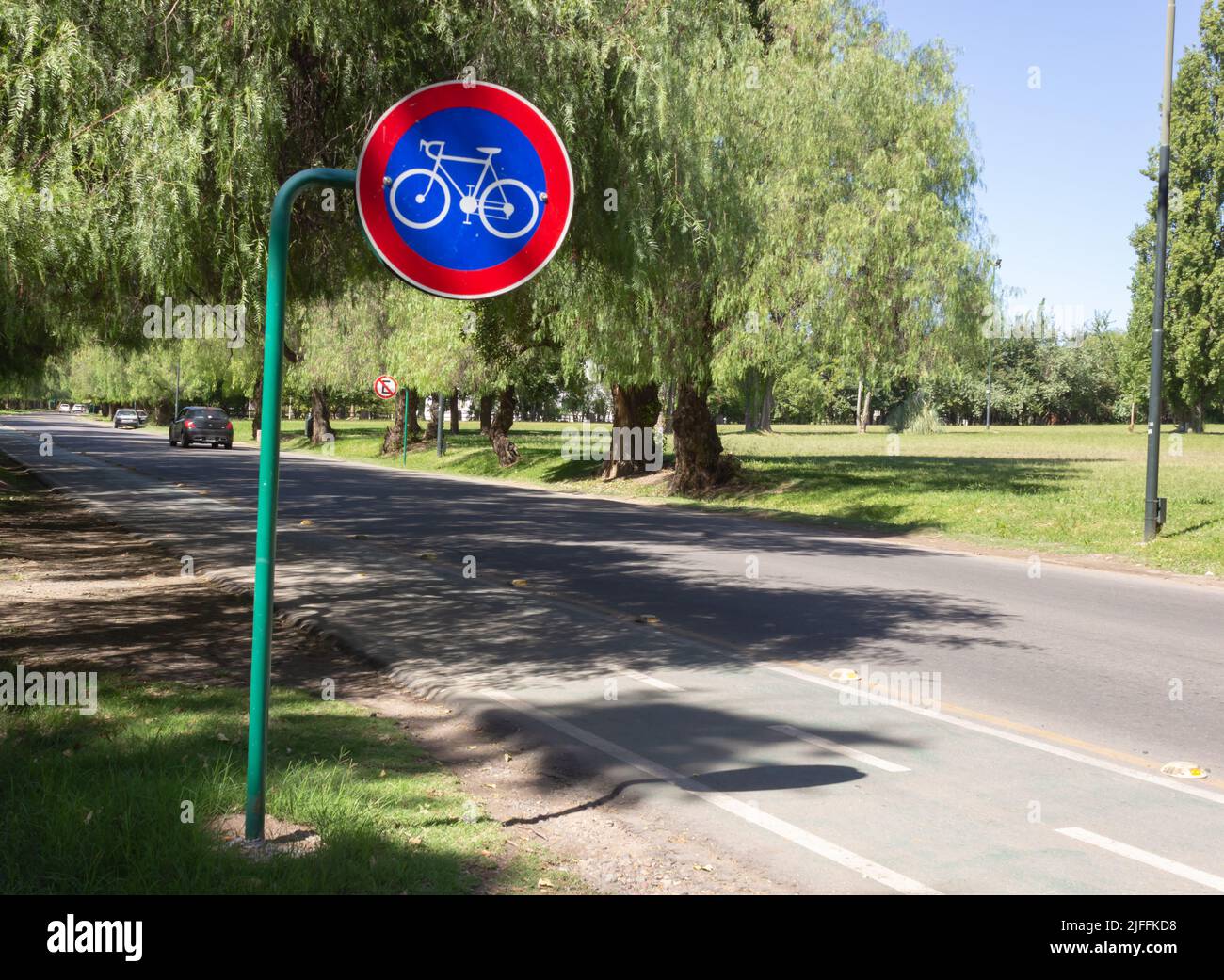 Sign in a park indicating: bicycles allowed Stock Photo - Alamy