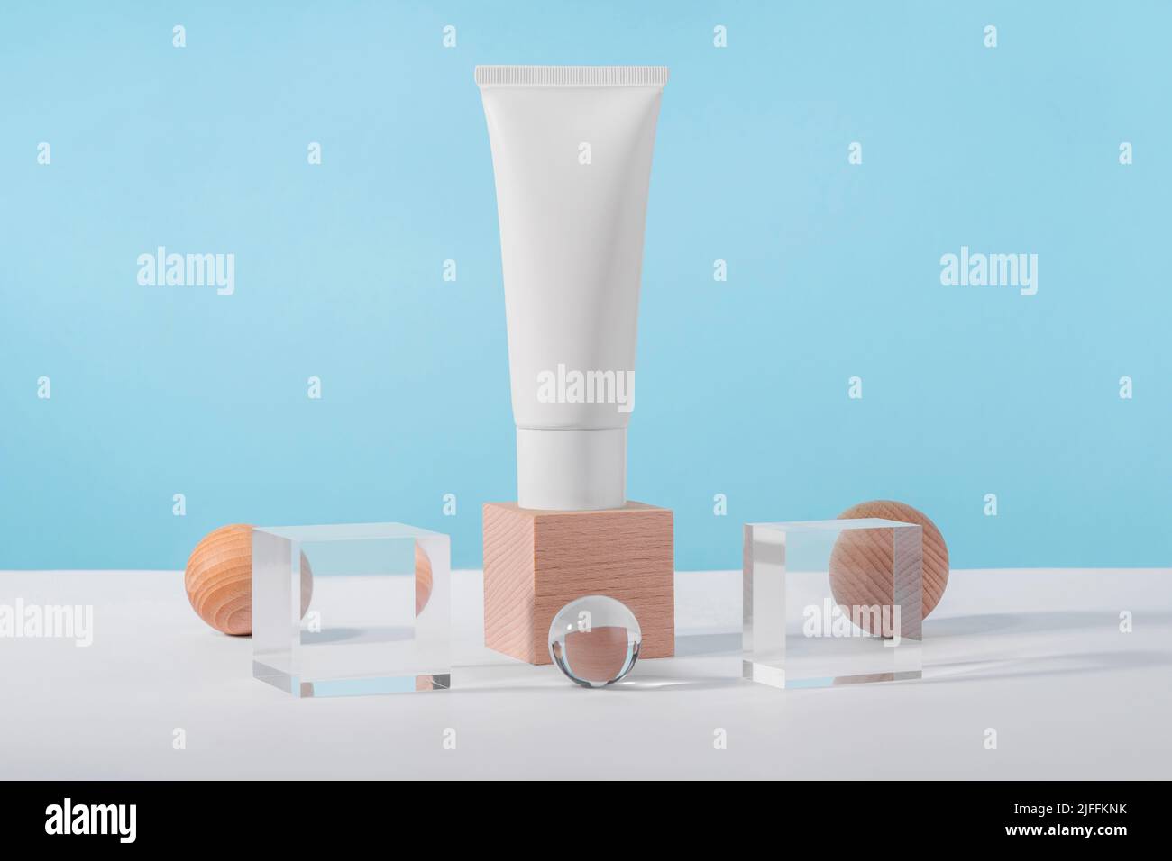 Medical skincare and cosmetic cream mockup on wooden block pedestal ...