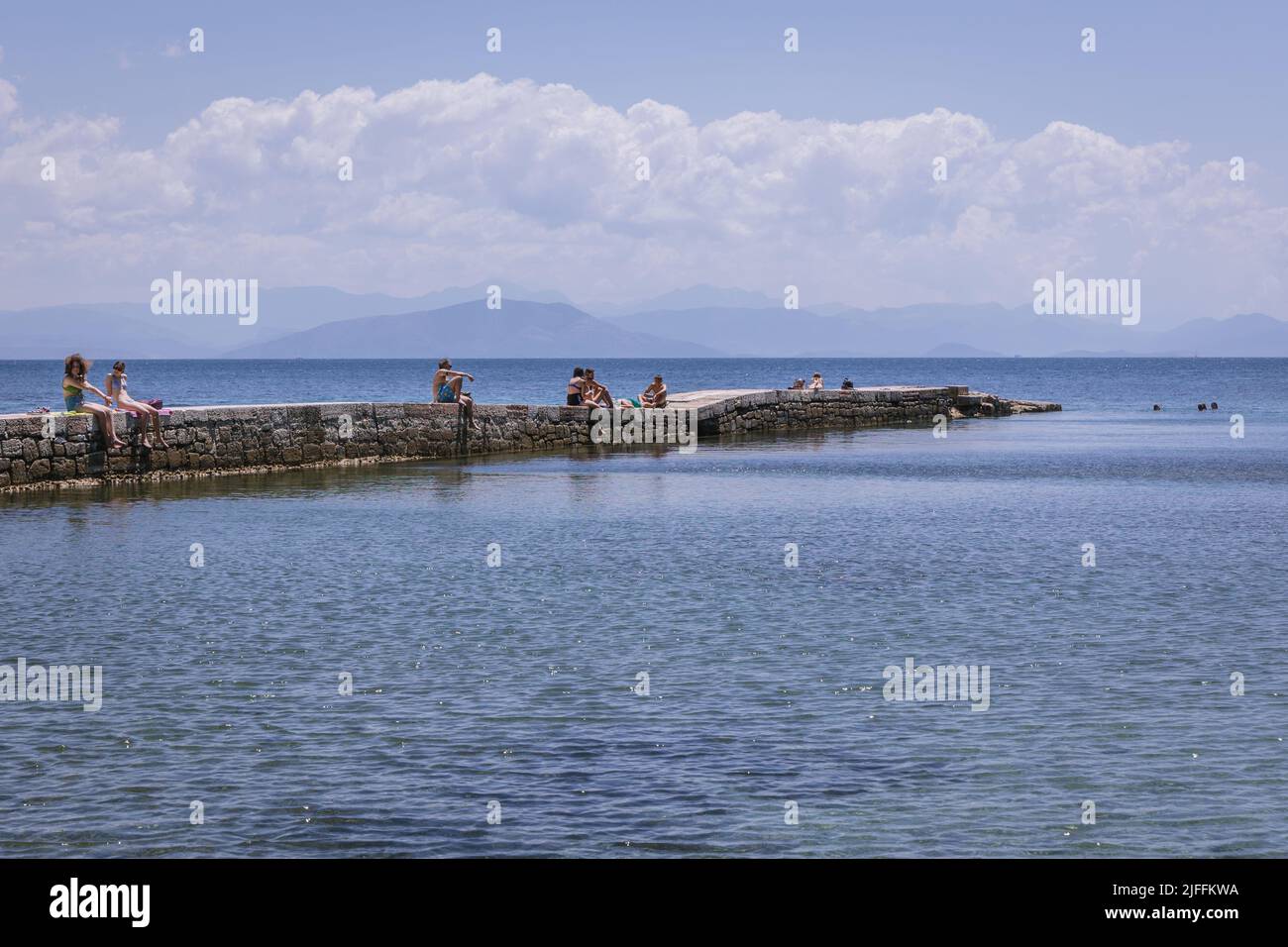 Dock on beach in park around Mon Repos villa in Corfu city on the ...