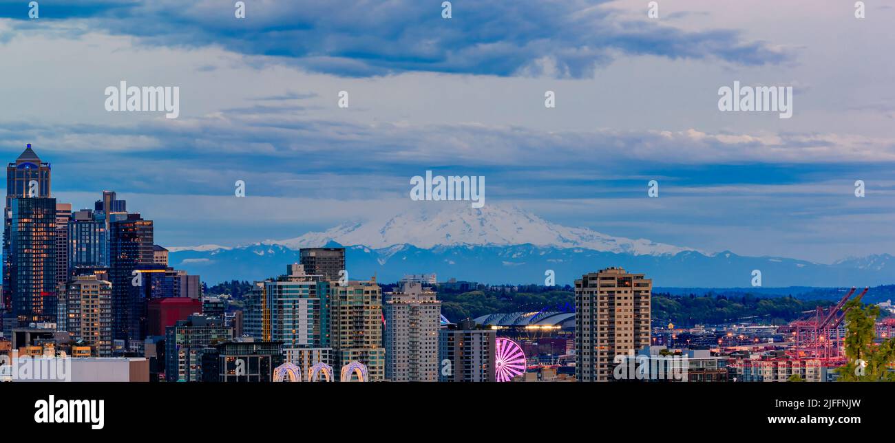 Downtown skyline panorama with Mount Rainier at sunset view from Kerry ...