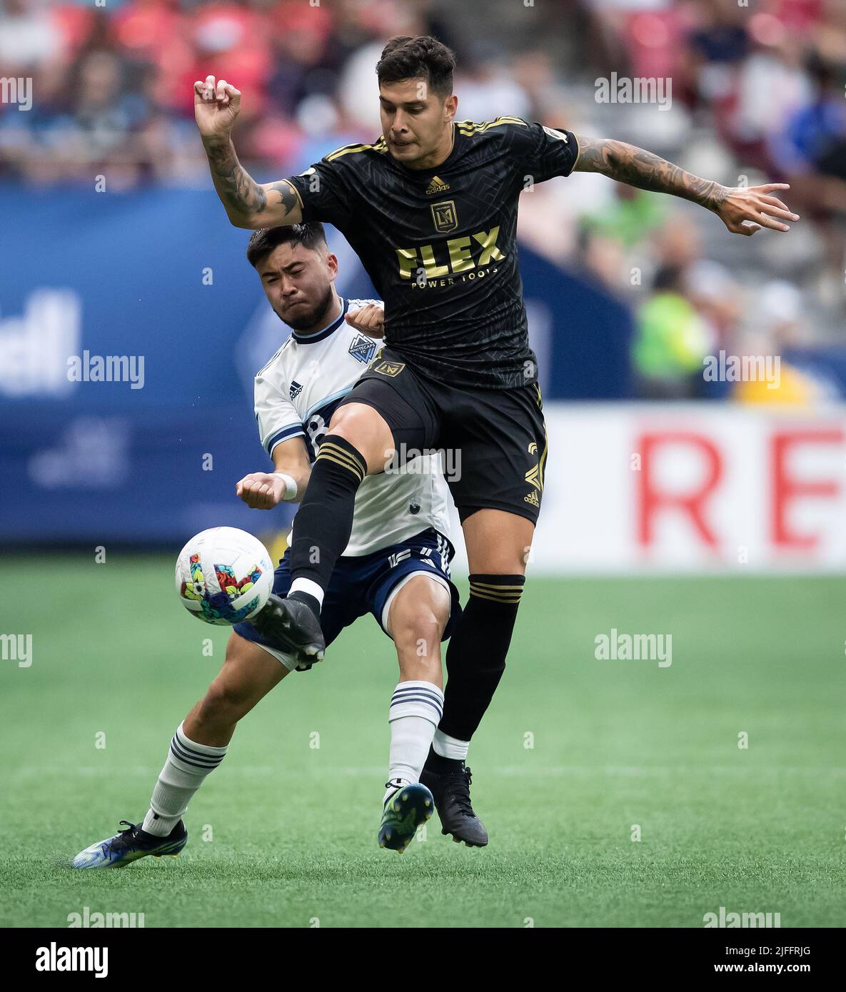 Los Angeles FC's Franco Escobar, front right, and Vancouver Whitecaps ...