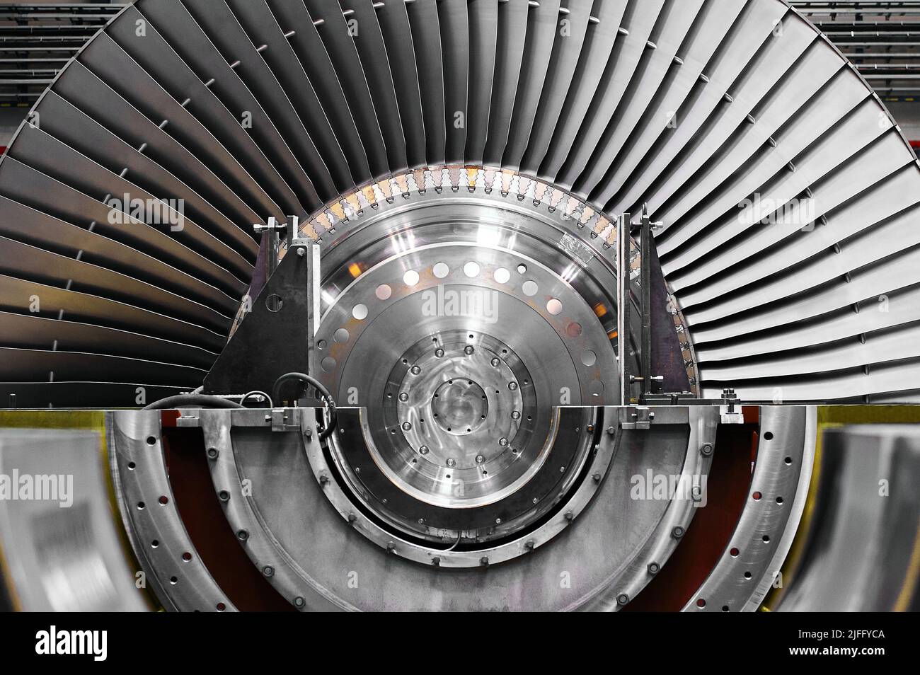 A powerful steam turbine rotor is installed in the lodgment of the ...
