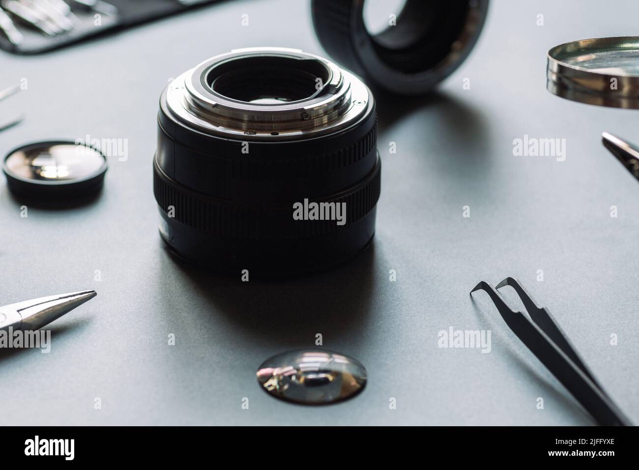 Precision optic photo lens service, adjust, align Stock Photo - Alamy