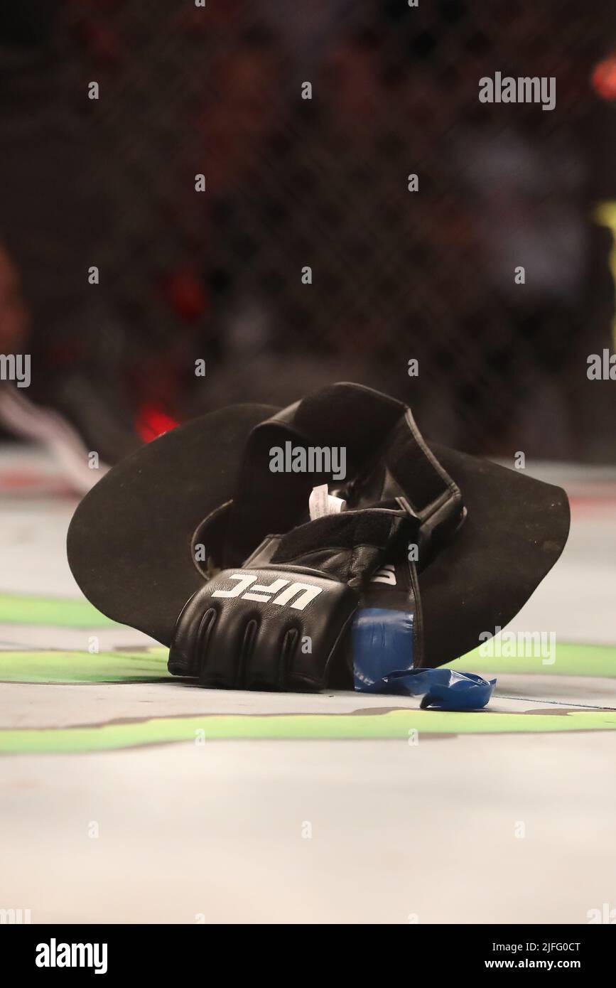 LAS VEGAS, NV - JULY 2: Donald Cerrone’s hat and glove is seen after he ...