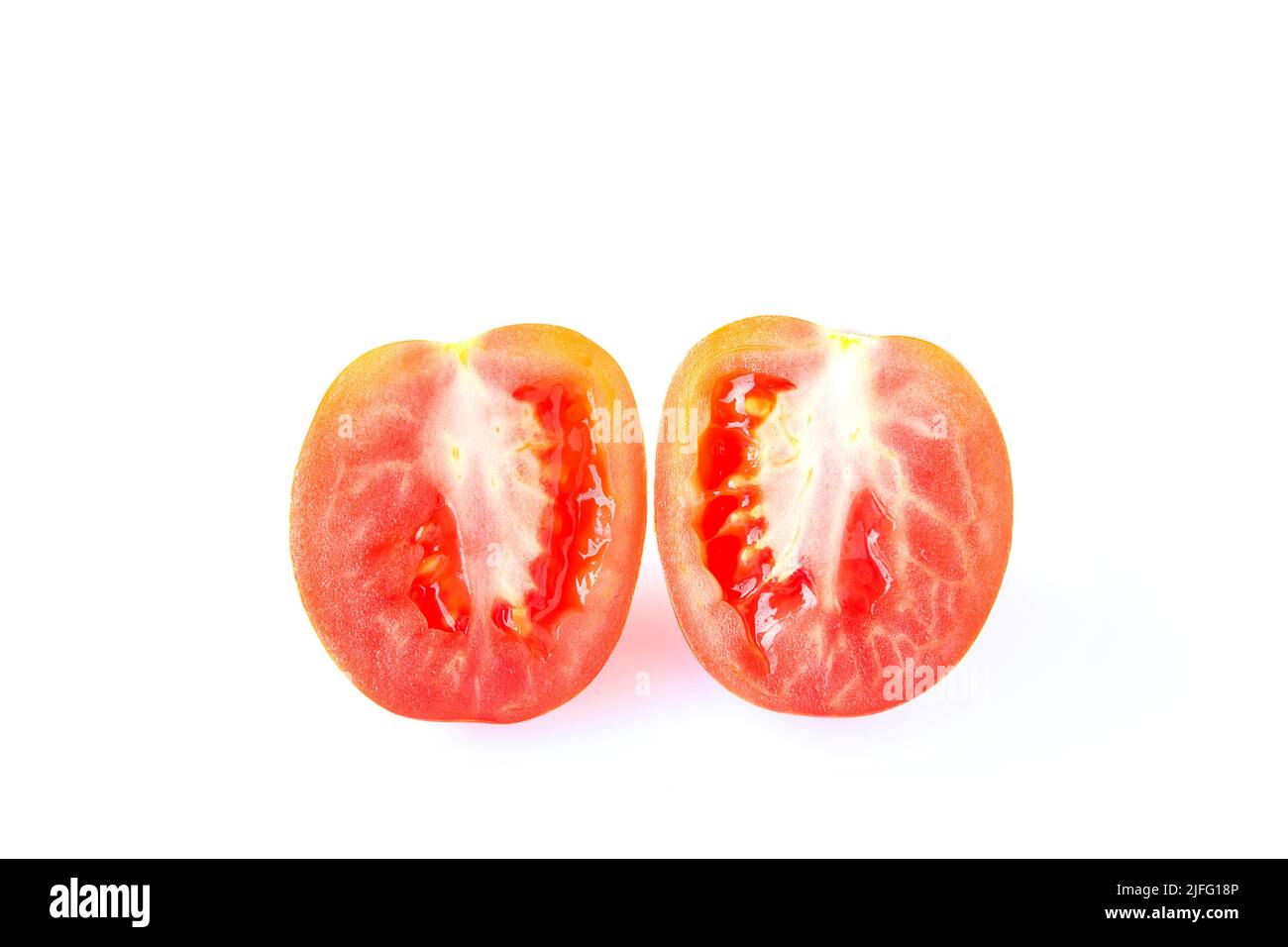 Red tomatos isolated on a white background Stock Photo - Alamy