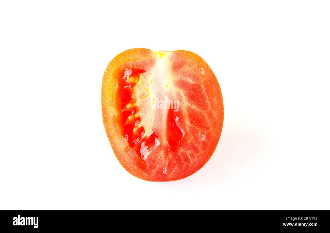 Red tomatos isolated on a white background Stock Photo - Alamy