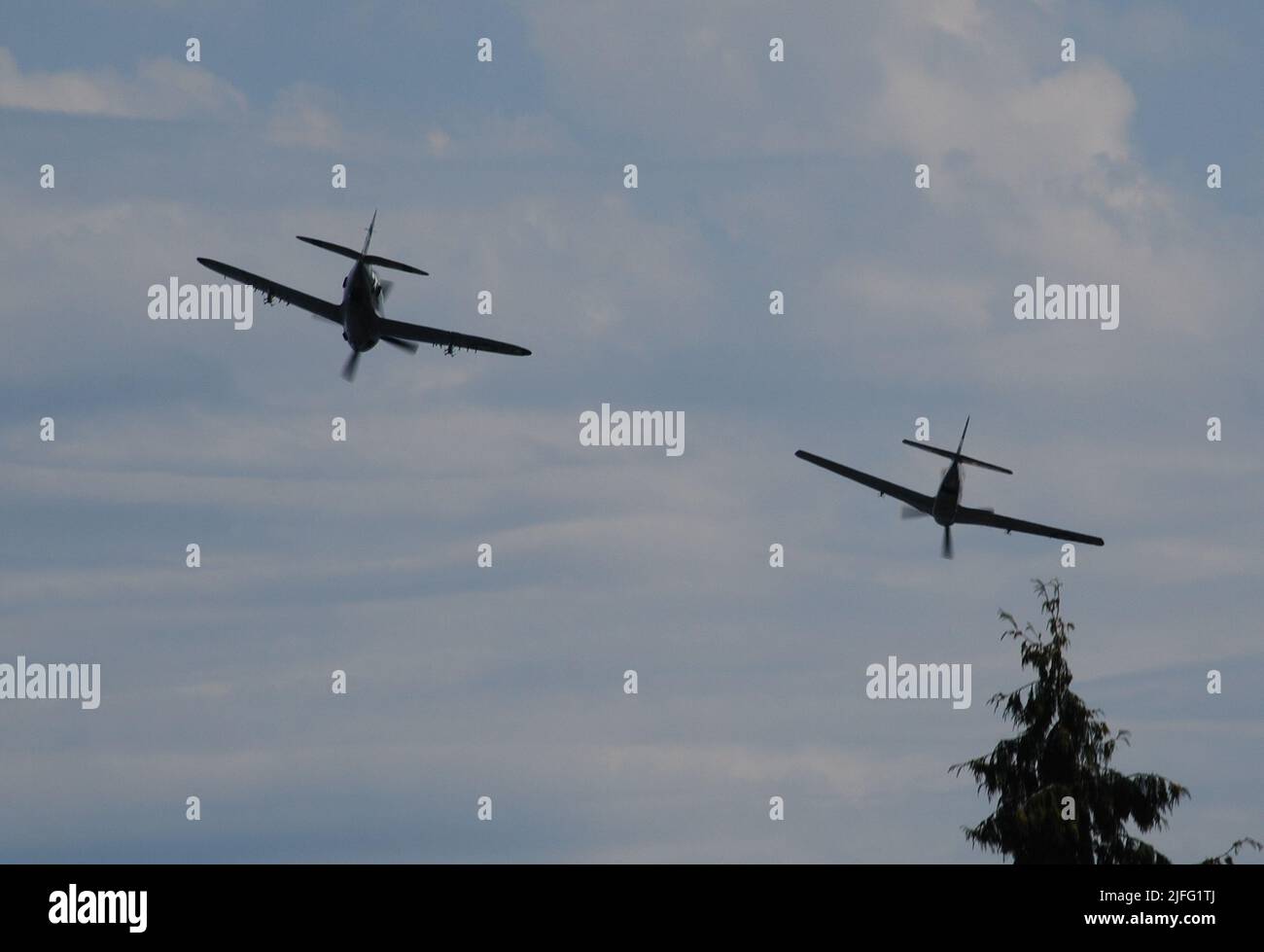 World War II restored fighter planes in flight Stock Photo - Alamy