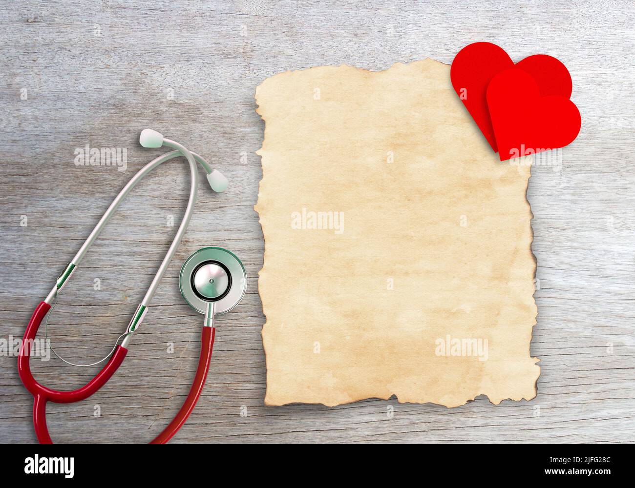 Old paper and red paper heart on wood table background Stock Photo - Alamy