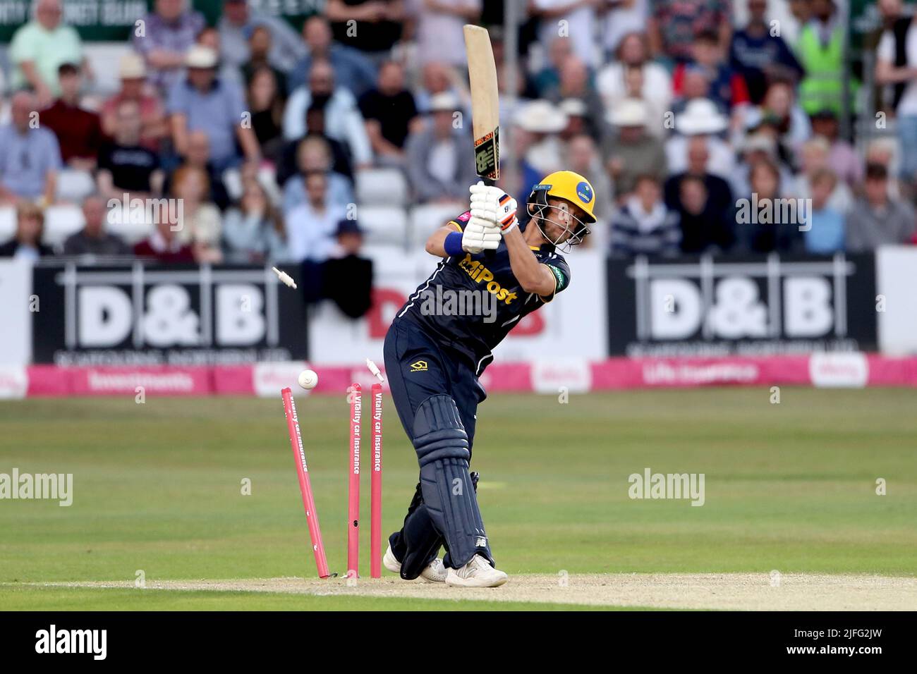 Billy Root of Glamorgan is bowled out by Aaron Beard during Essex ...