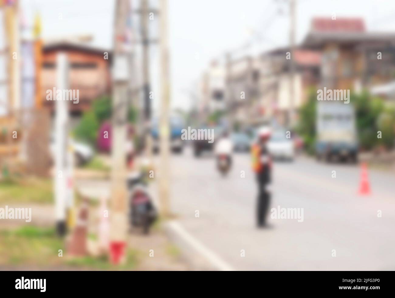 Blurred image traffic police work in the street - abstract blurred ...