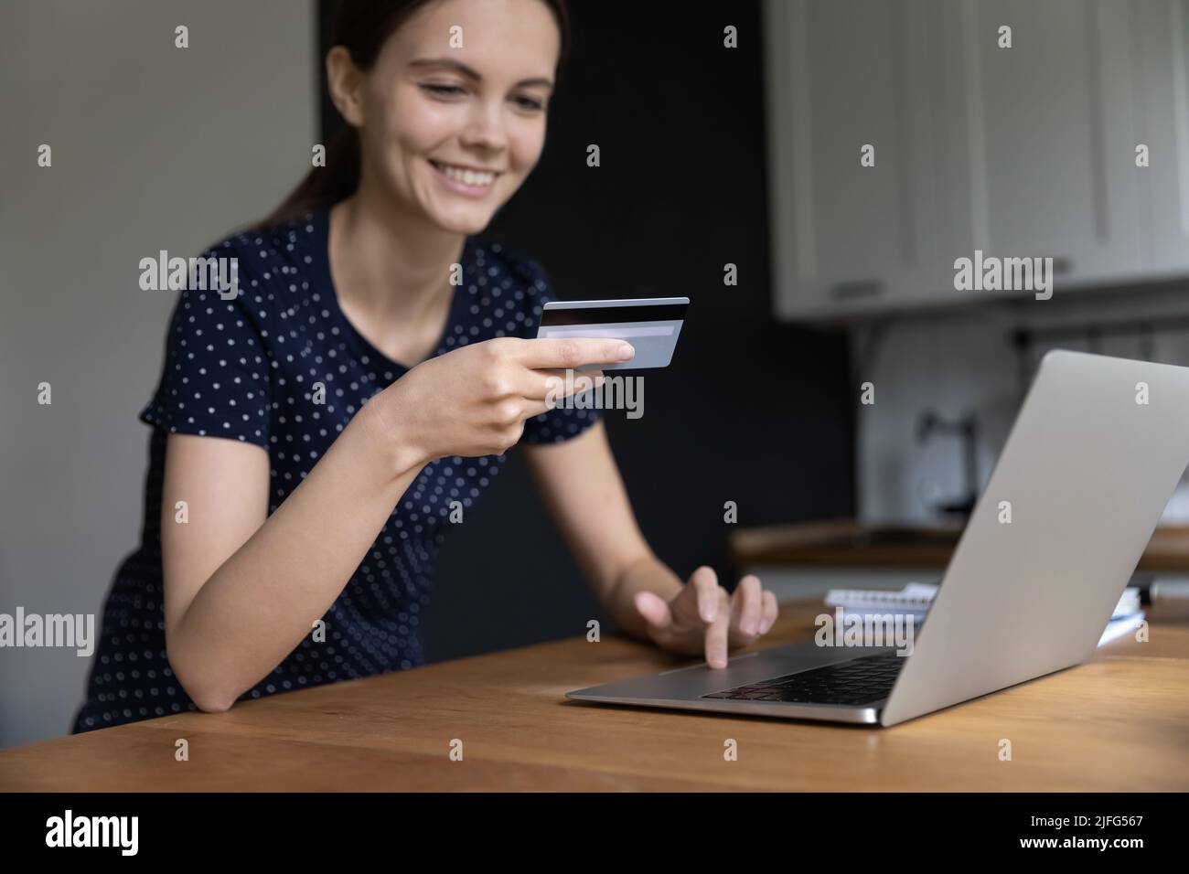 Satisfied bank customer using credit card and virtual bank app Stock ...