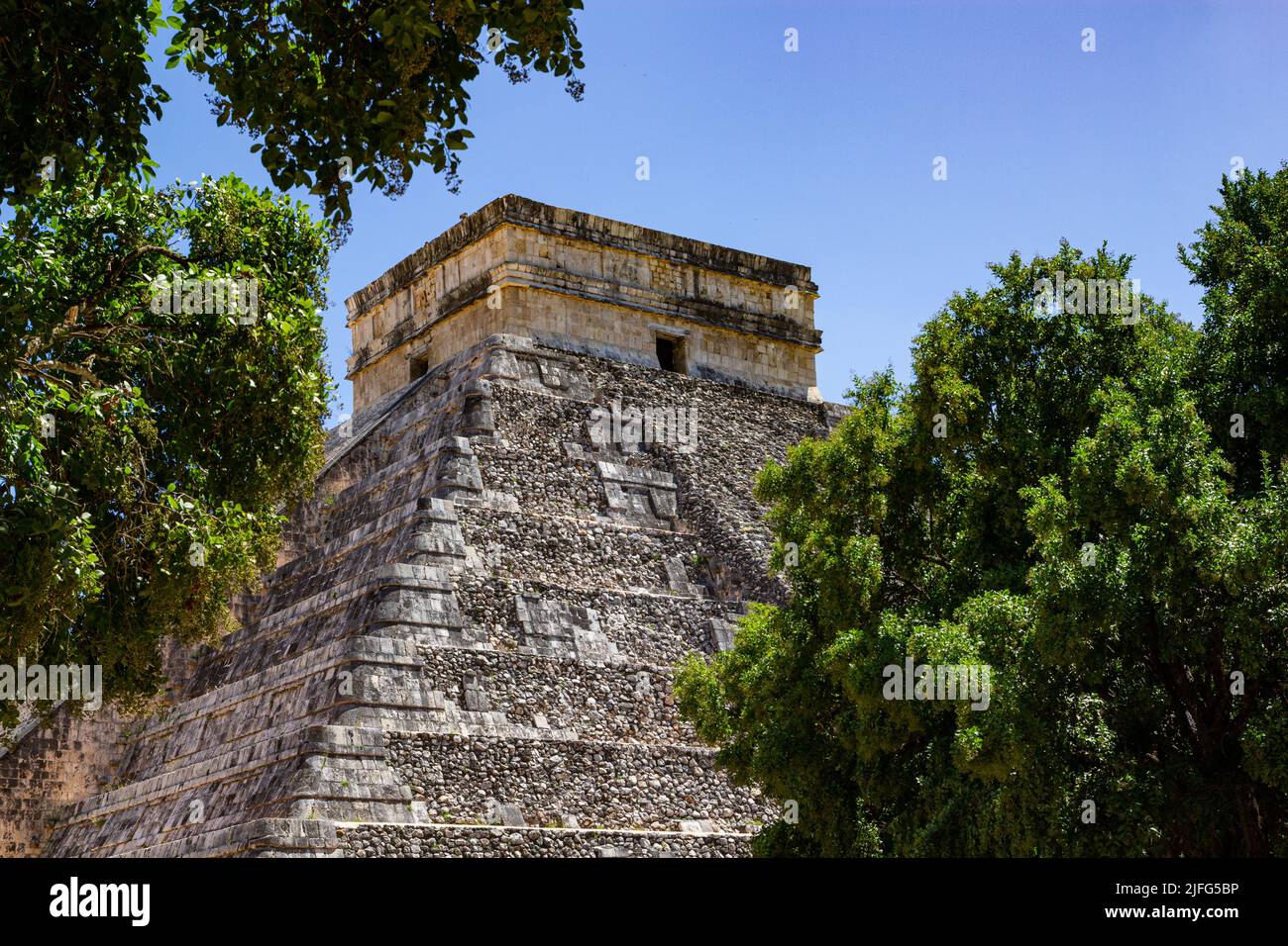 A view of the El Castillo Pyramid of Maya ruins in Chichen Itza, Mexico ...