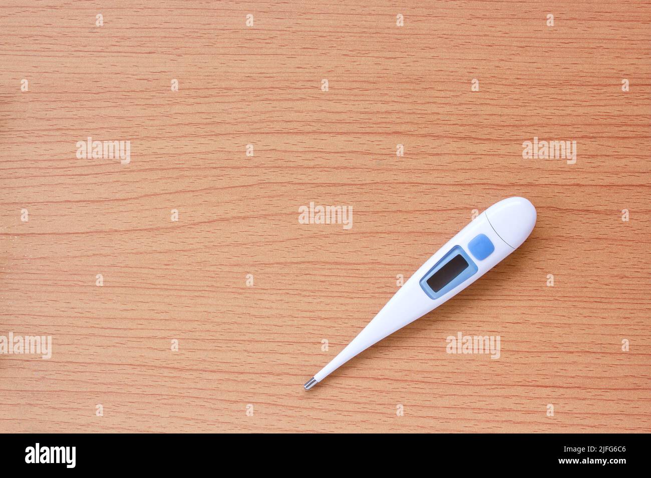 Thermometer on wooden table top view with copy space for design Stock ...