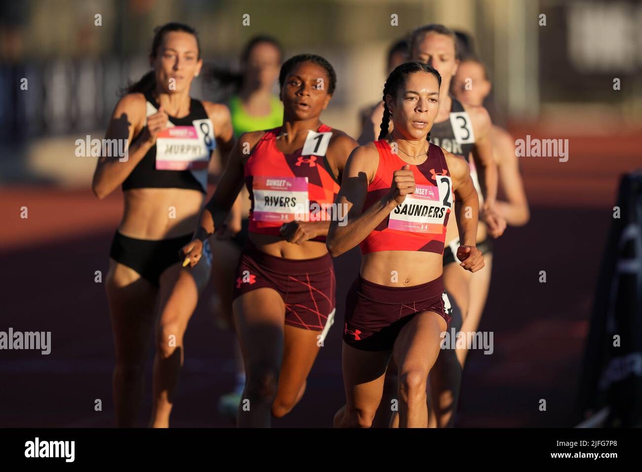 Claudia Saunders leads the women's 800m during the Under Armour Sunset ...