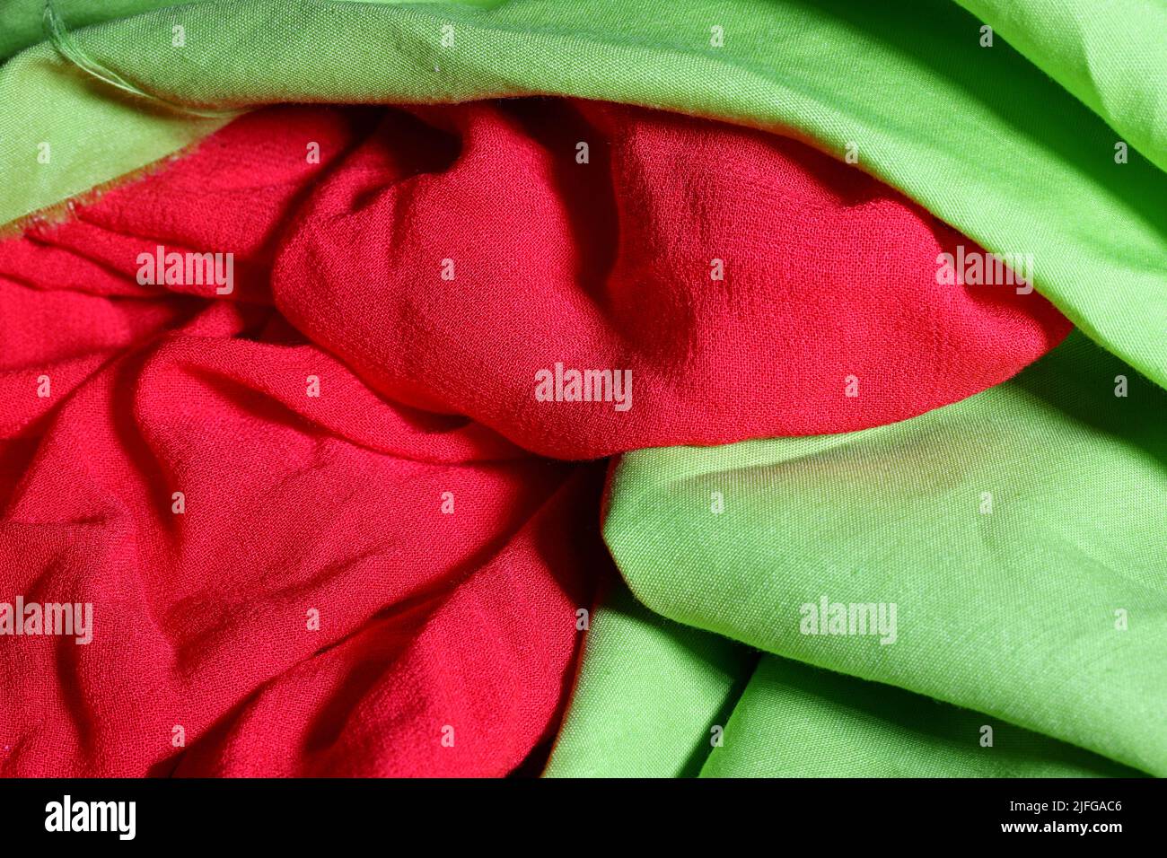 Red and green fabric texture background Stock Photo - Alamy