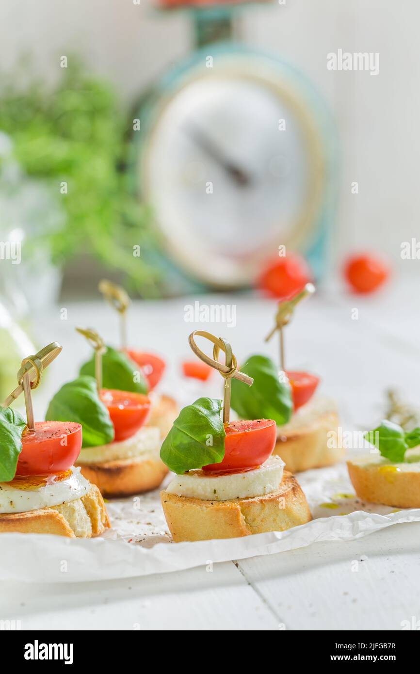 Hot and crisp crostini made with mozzarella and tomatoes Traditional ...