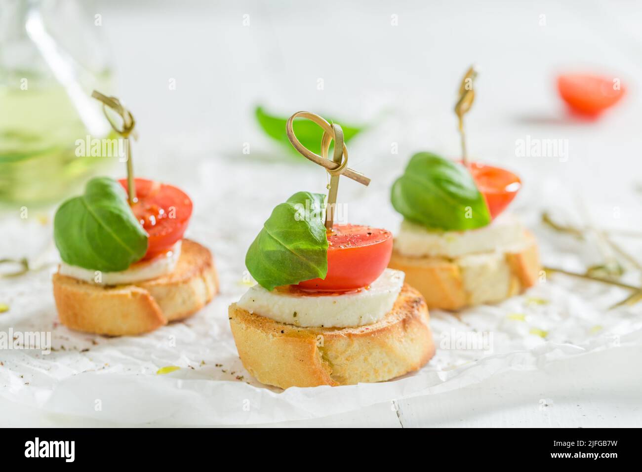 Hot and crisp crostini with tomatoes, basil and mozzarella Italian ...