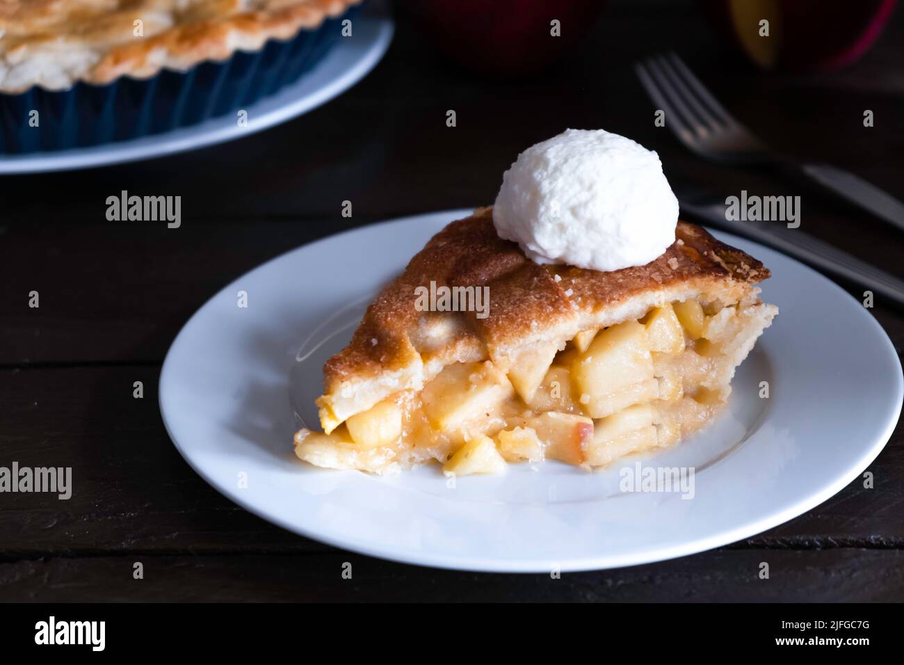 Apple pie. Slice of an apple pie with ice Stock Photo - Alamy