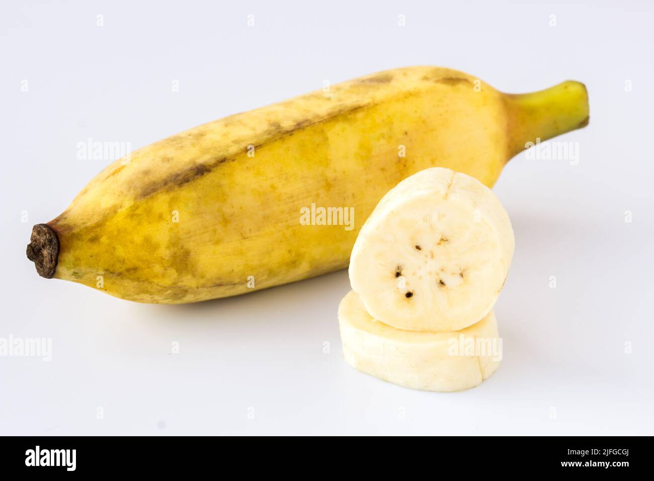 Close up banana isolated on a gary background Stock Photo - Alamy