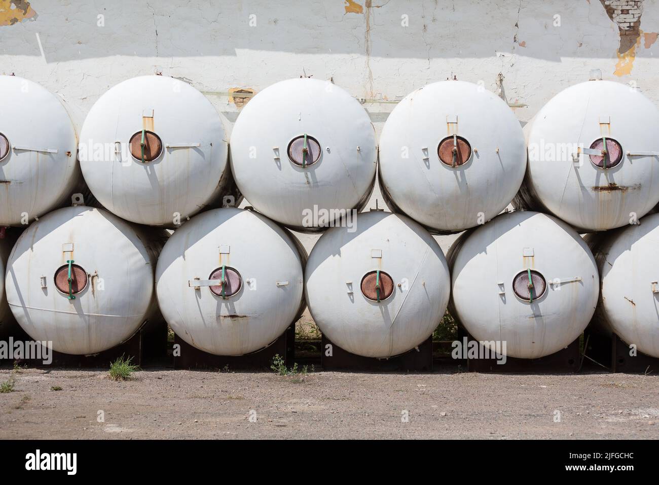 Large abandoned old white cisterns for industrial wine production Stock ...
