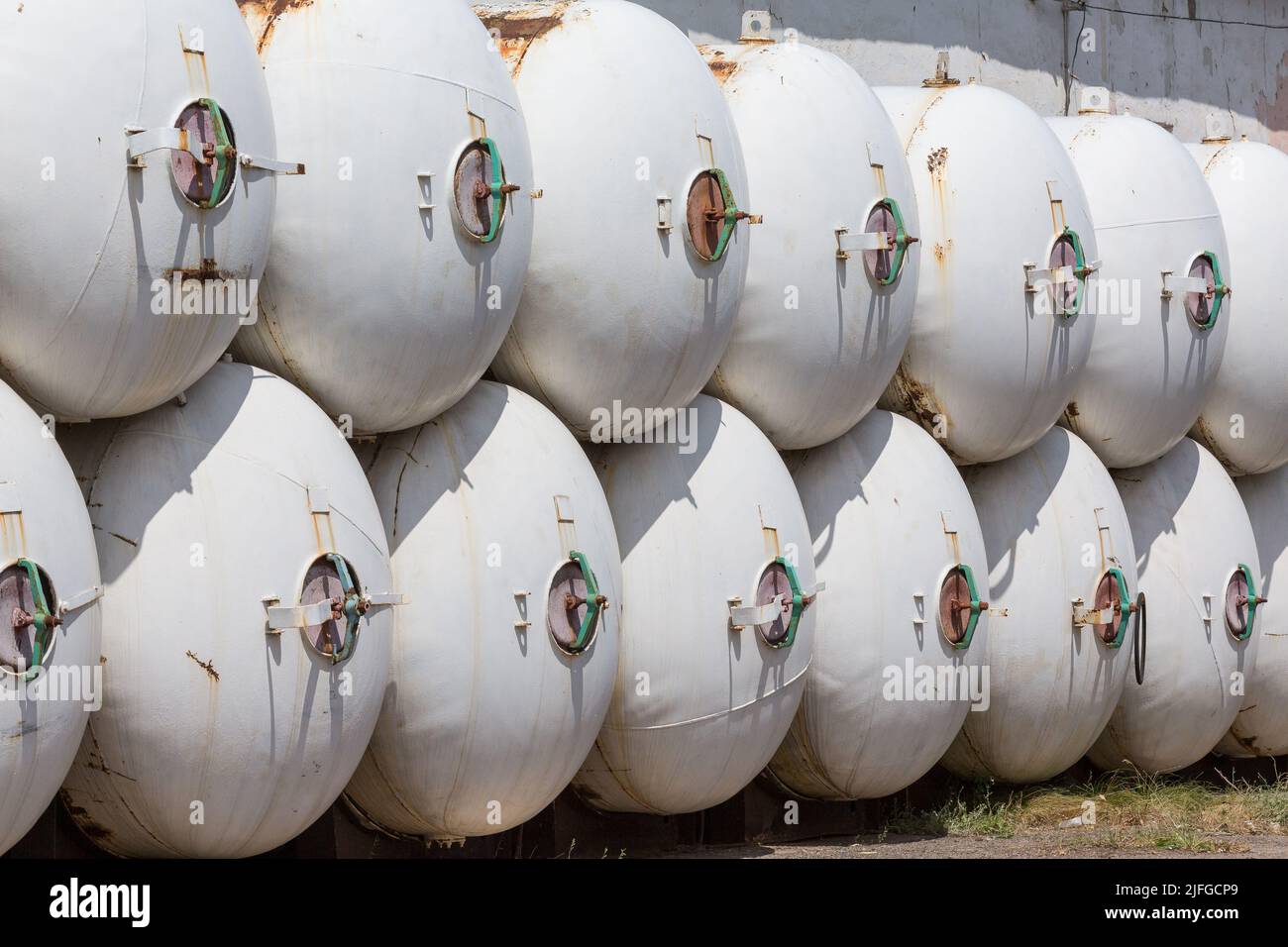 Large abandoned old white cisterns for industrial wine production Stock ...