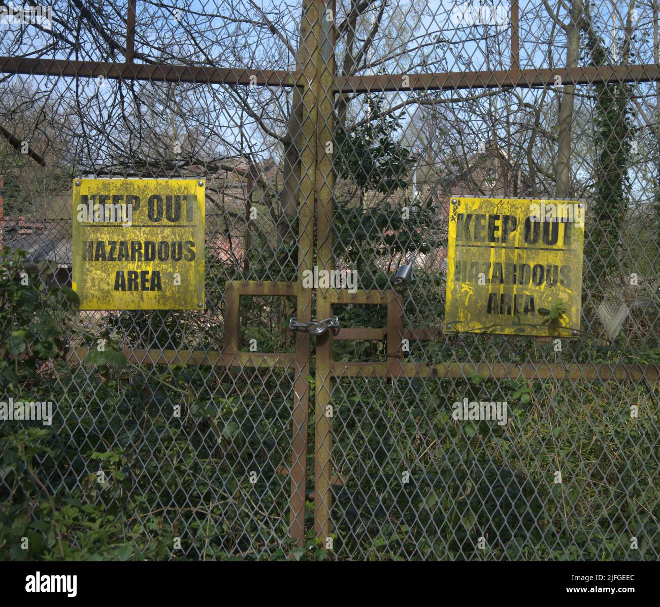 A close-up shot of the keep-out sign hanged on a metallic fence Stock ...