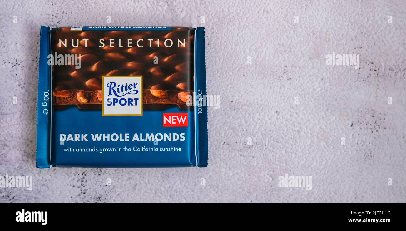 Kiev Ukraine - October 2021 DARK WHOLE ALMONDS taste. Nut selection ...