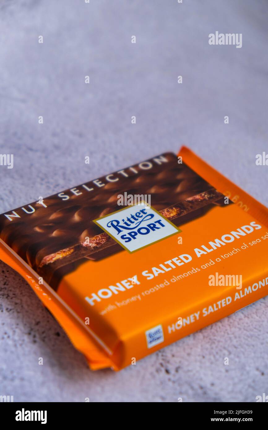 Kiev Ukraine - October 2021 HONEY SALTED ALMONDS taste. Nut selection ...