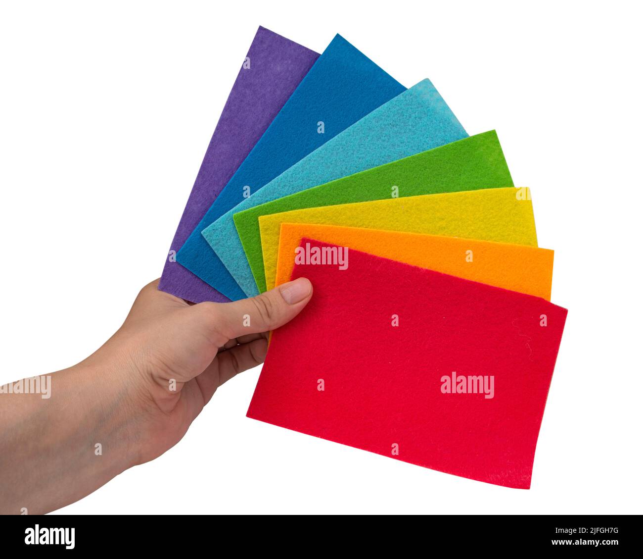 Rainbow felt examples in hand isolated on the white background Stock ...