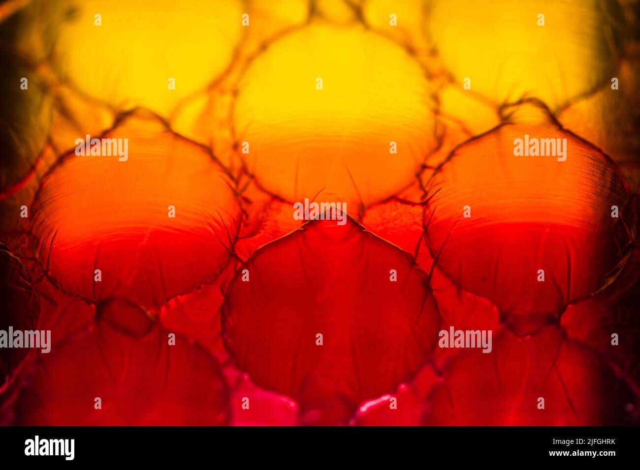 An abstract red and yellow texture background and empty space to use as ...