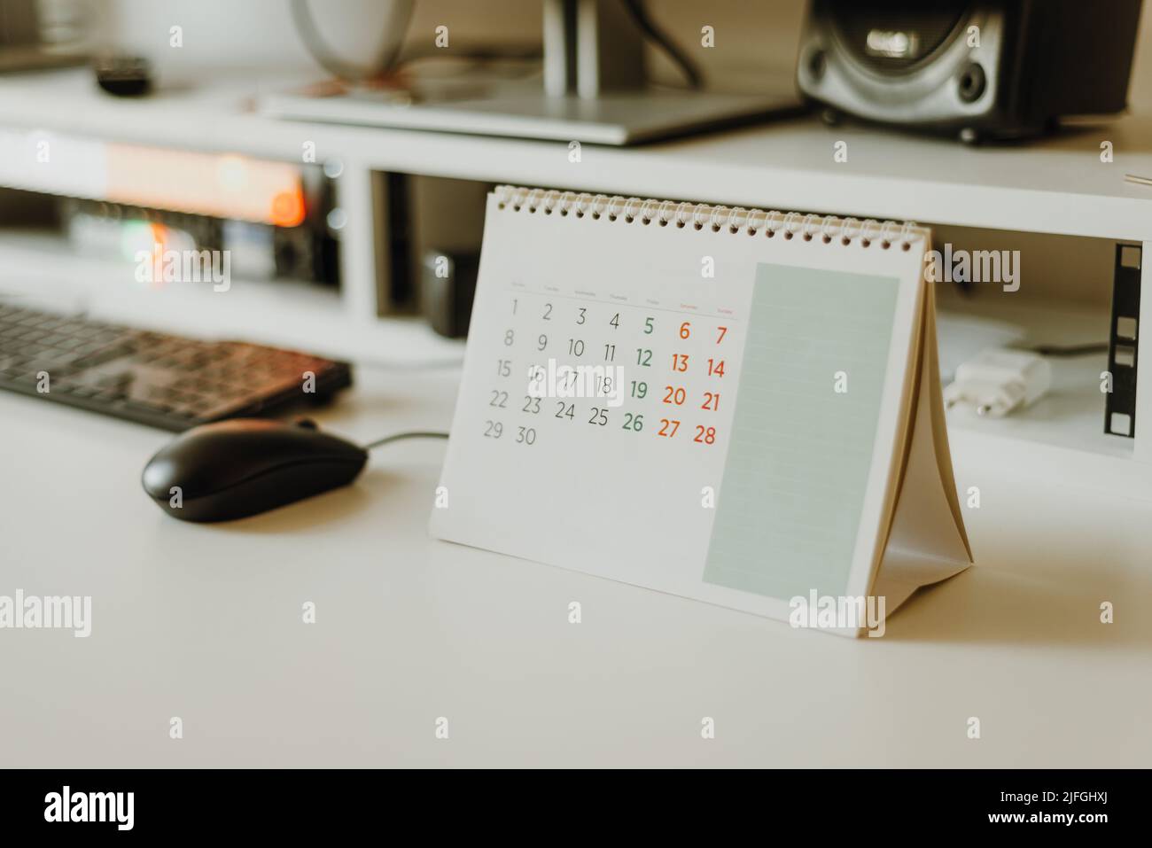 A closeup shot of a calendar on an office table Stock Photo - Alamy