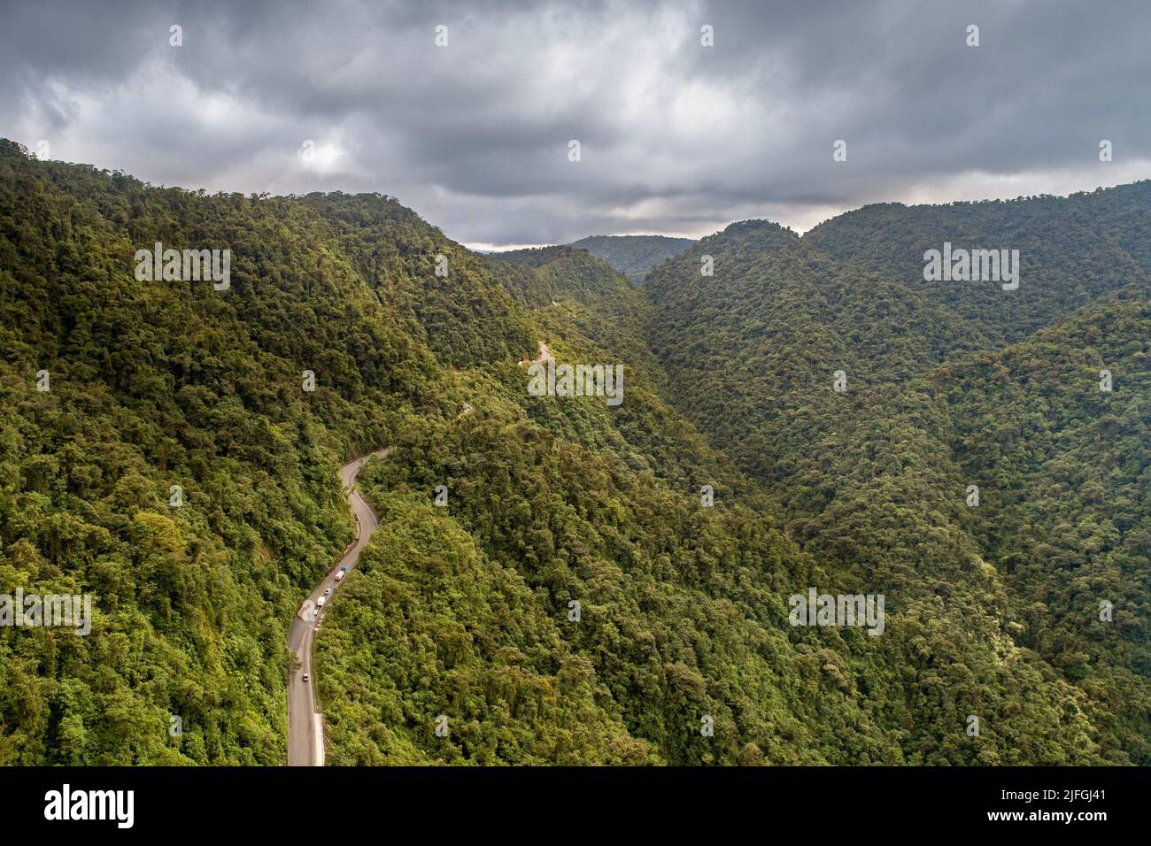 A beautiful shot of some green mountains under the cloudy sky Stock ...